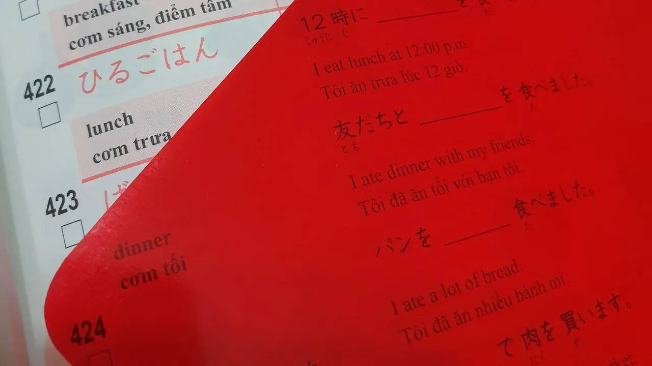 Why do Japanese students have red sheet in their Books while studying ...