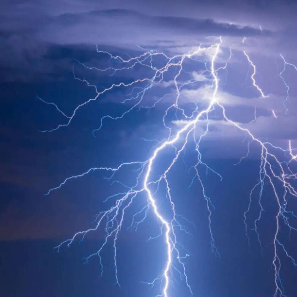 How many volts of current contained in lightning bolt striking from sky ...