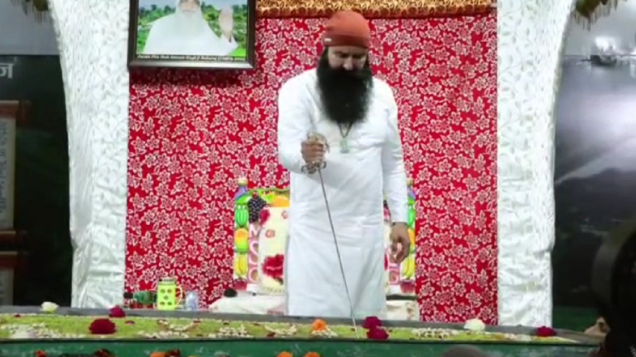 Dera chief Gurmeet Ram Rahim cuts cake with sword, video goes viral ...
